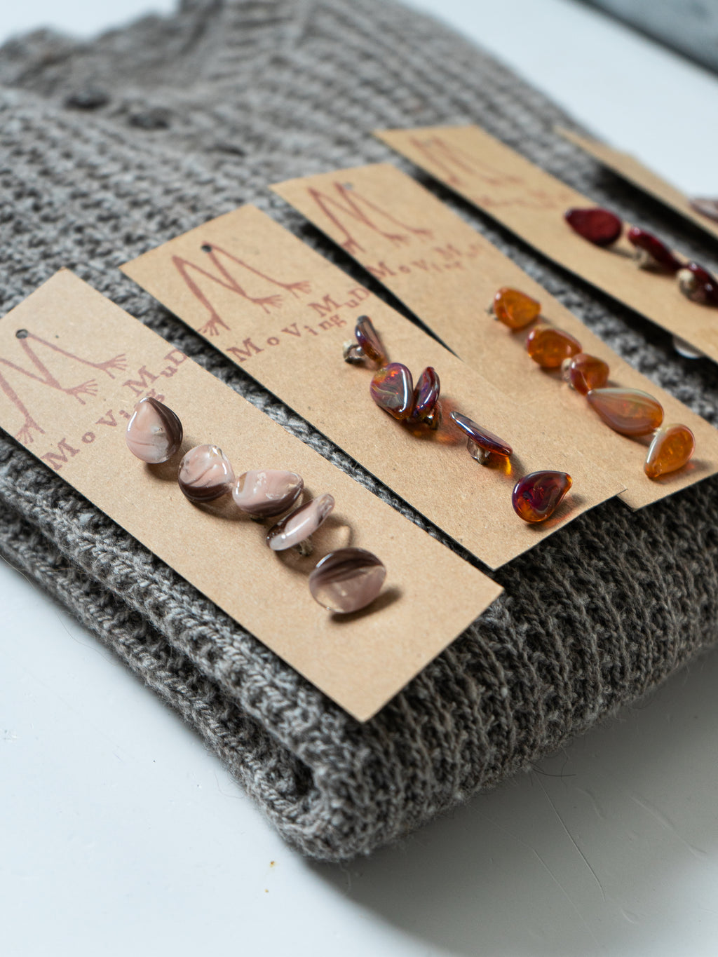 Moving Mud Teardrop Glass Button Set